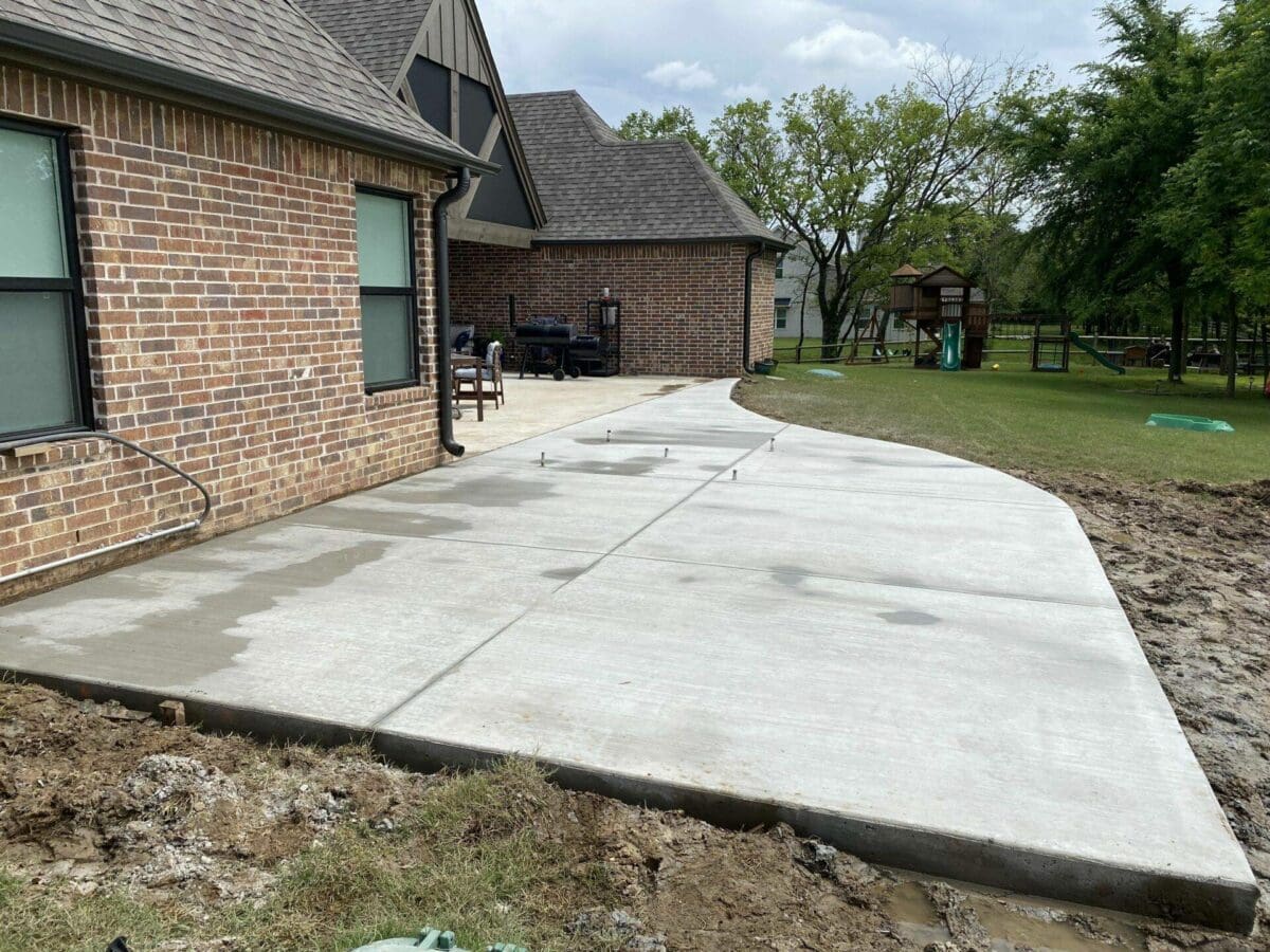 Concrete Shop Pad and Concrete Patio with Splash Pad